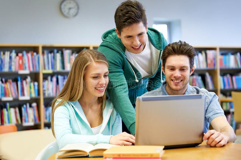Happy Students with Laptop in Library Stock Photo - Image of concept ...