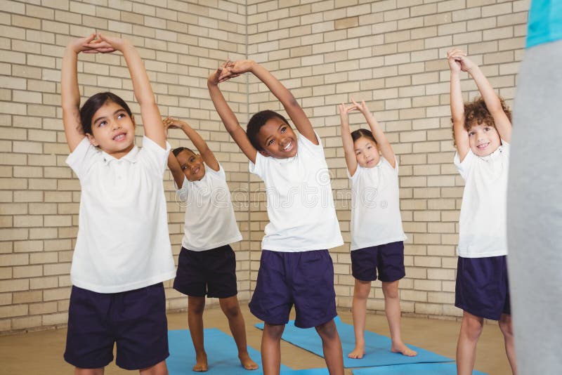 Happy Students Stretching Out Together Stock Photo - Image of ...