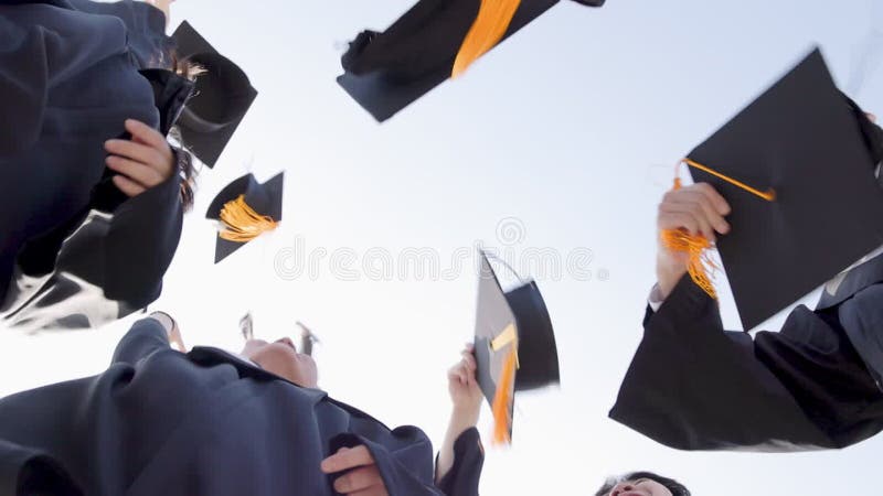 Happy Students Throwing Graduation Hats in Air Stock Video - Video of ...