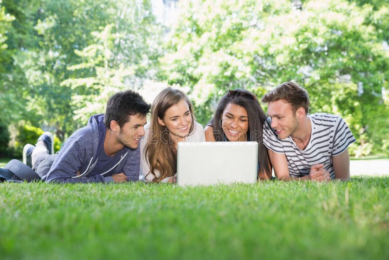 Happy Students Using Laptop Outside Stock Image - Image of adult ...