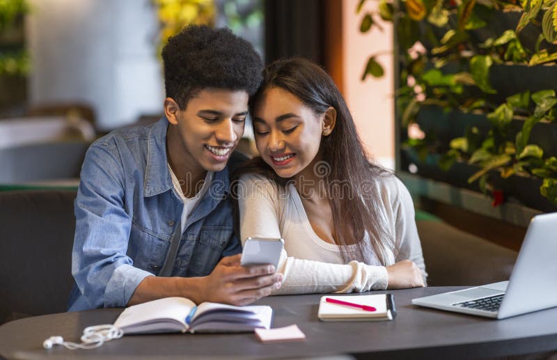 Happy Students Using Mobile Application for Studying Stock Photo ...