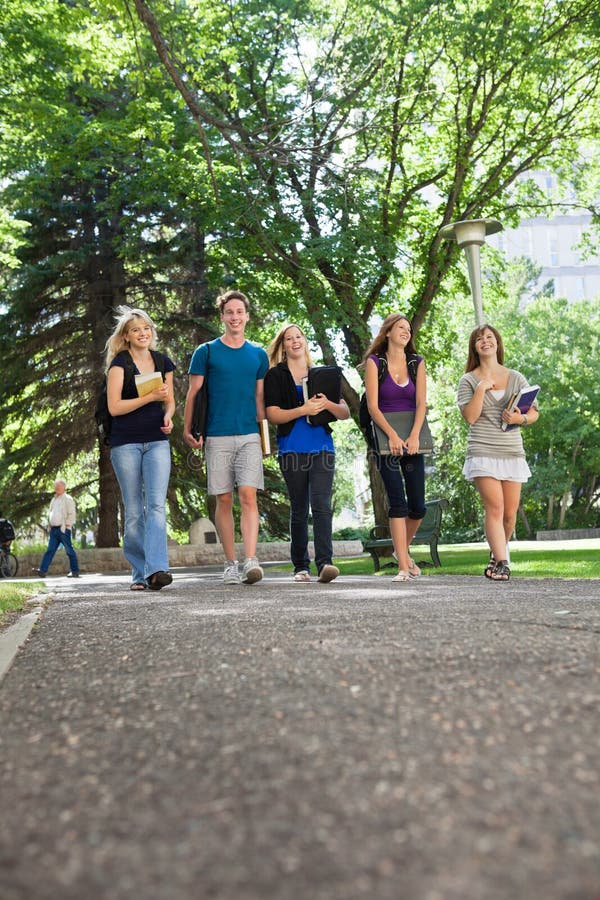 Happy Students Walking on Campus Stock Image - Image of outdoor ...