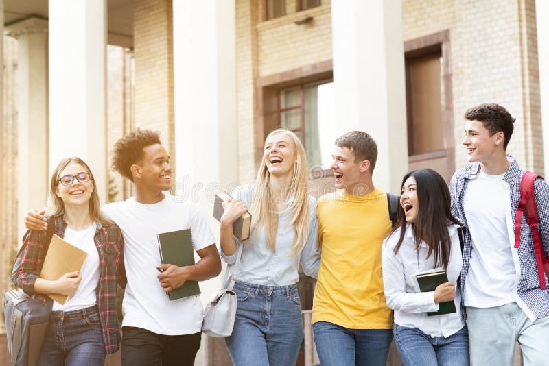 Happy Students Walking Together in Campus, Having Break Stock Photo ...