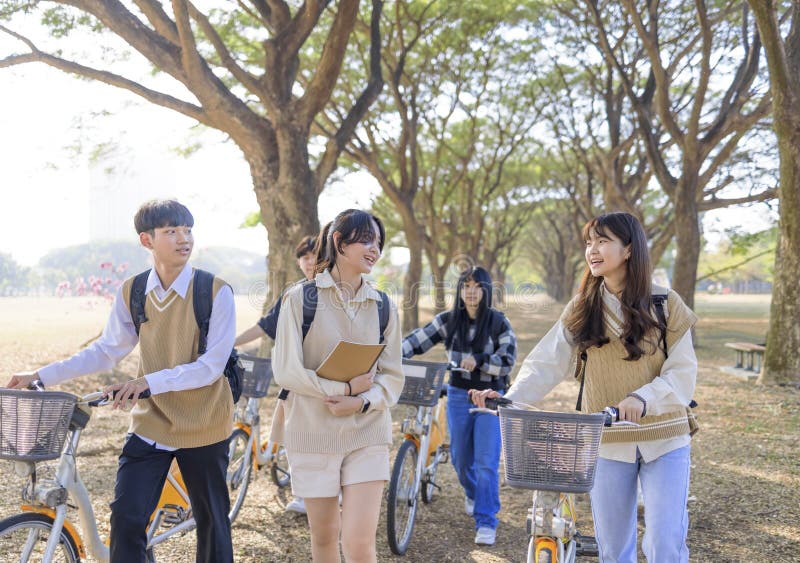 Happy Students Walking Together in the Park Stock Photo - Image of ...