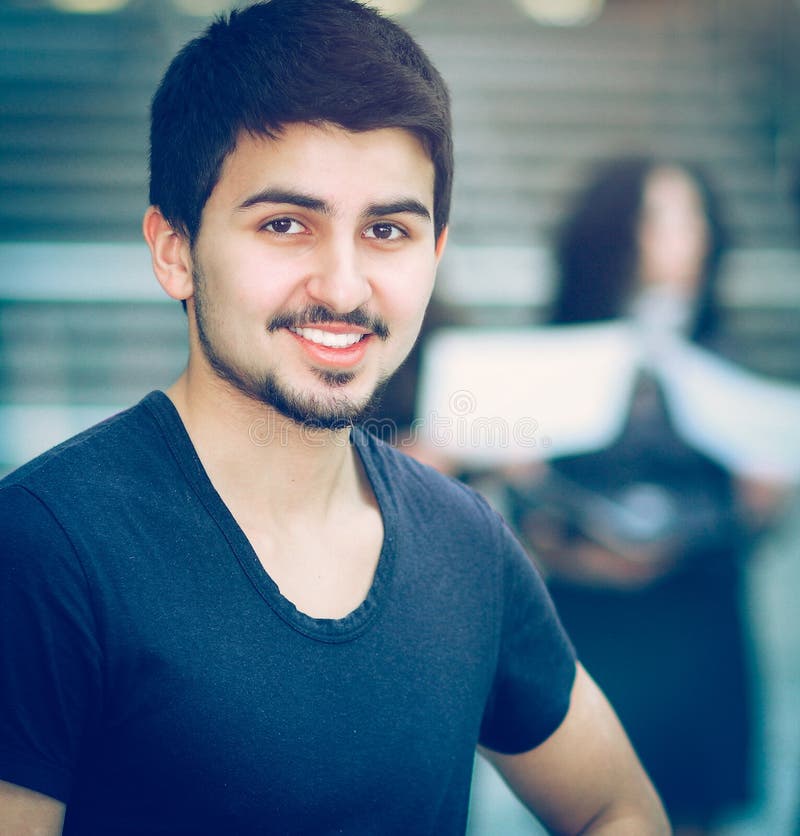 Happy Successful Manager in the Office on the Background of Working ...