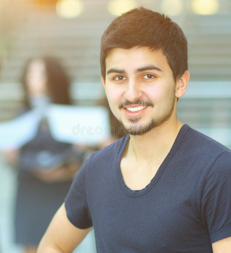 Happy Successful Manager in the Office on the Background of Working ...