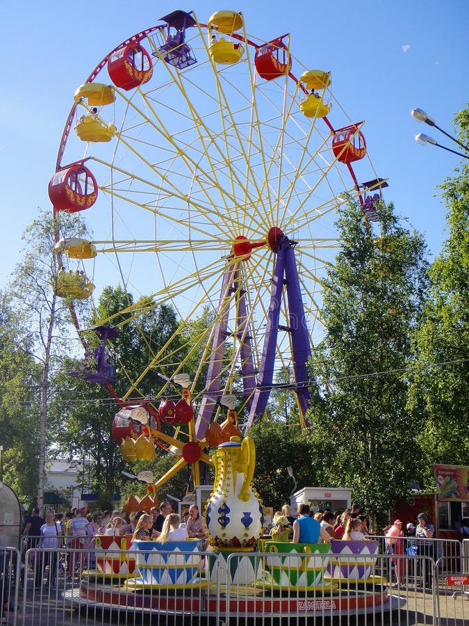 Carousel editorial stock photo. Image of garden, swing - 100473388