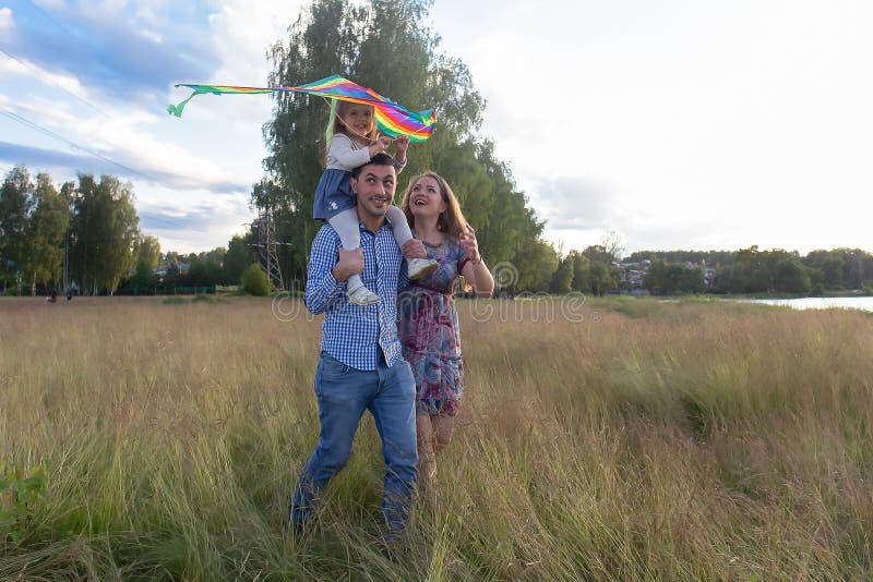 A Happy Summer Family Outdoors Stock Image - Image of park, father ...