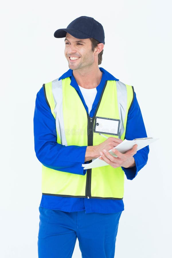 Happy Supervisor Wearing Hard Hat While Holding Clip Board Stock Photo ...