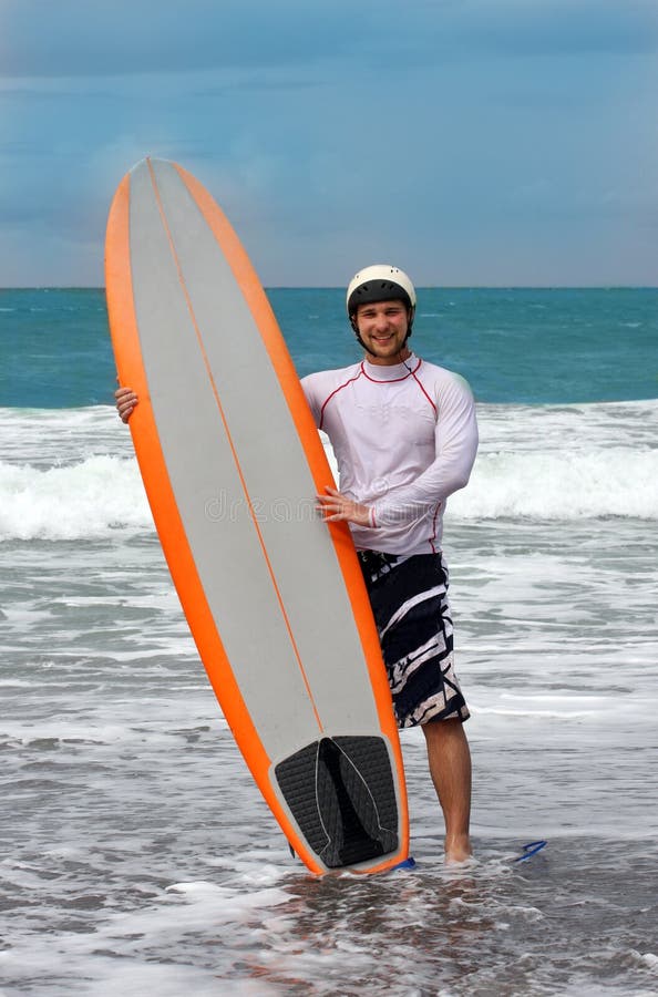 Happy Surfing Man on Bali Island Stock Image - Image of coastline, surf ...