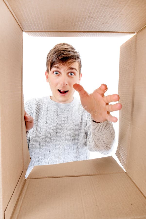 Man looking inside a Box stock image. Image of shipping - 244268007