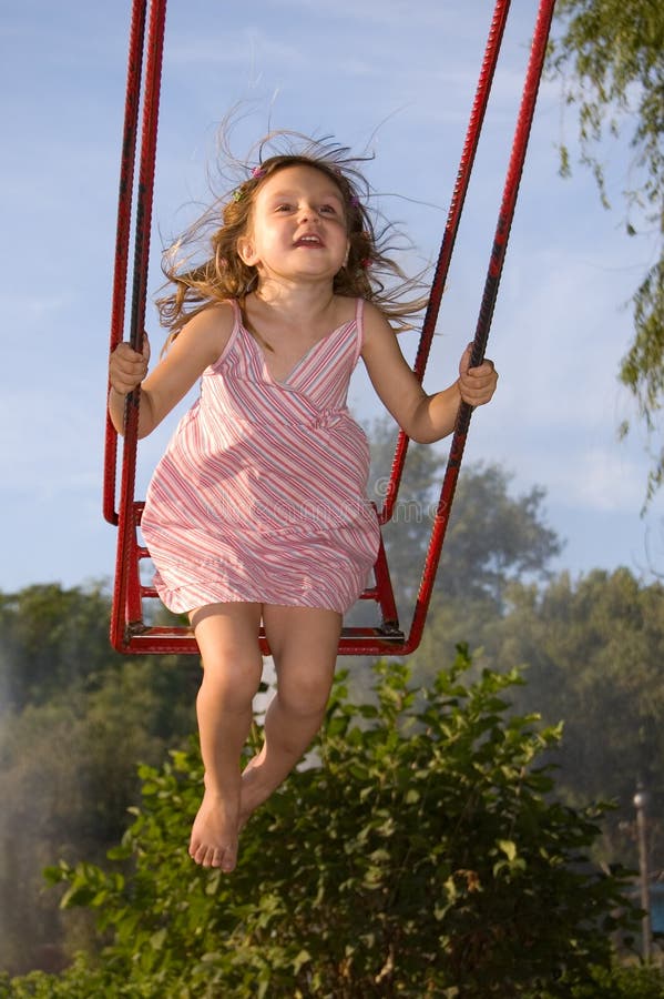 Happy swinging stock image. Image of barefoot, fountain - 5557609