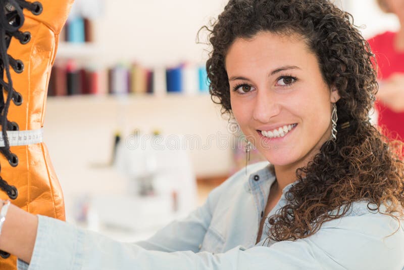 Happy Tailors Stitching Fabrics in Sewing Factory Stock Image - Image ...