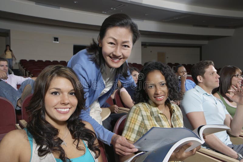 Happy Teacher and Students in Classroom Stock Image - Image of ...