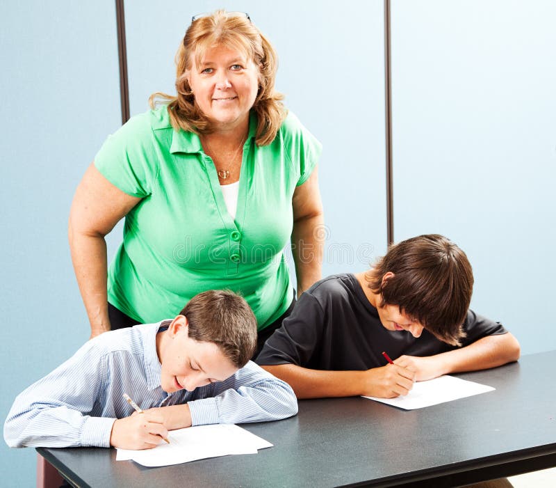 Happy Teacher with Students Stock Photo - Image of real, instructing ...