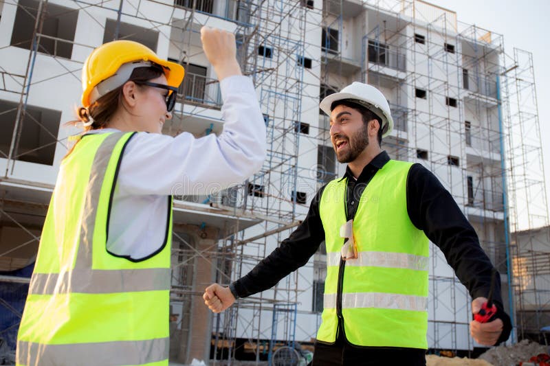 Happy Team of Architect or Engineer with Success and Glad at ...