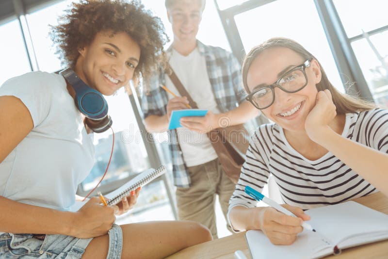 Close Up of Cheerful Students Doing Their Home Assignment Stock Image ...