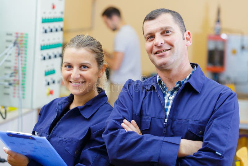 Happy Team Looking at Camera Stock Image - Image of male, adult: 247686169