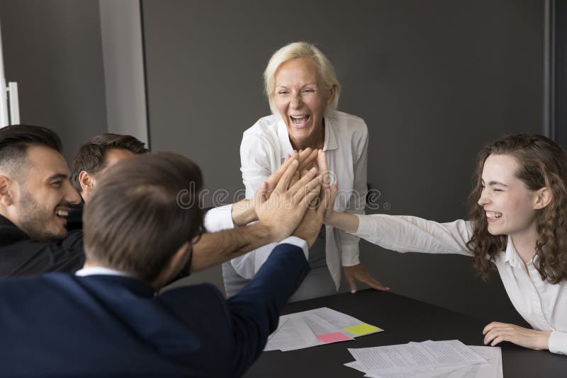 Happy Team Stack Their Hands Together, Showing Unity, Finish Teamwork ...