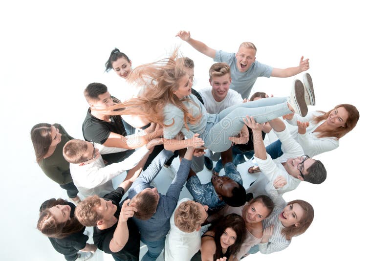 Happy Team of Young People Rocking Their Leader. Stock Photo - Image of ...