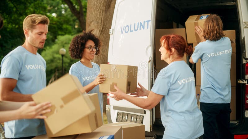 Happy Team of Young Volunteers Preparing Humanitarian Aid and Donations ...