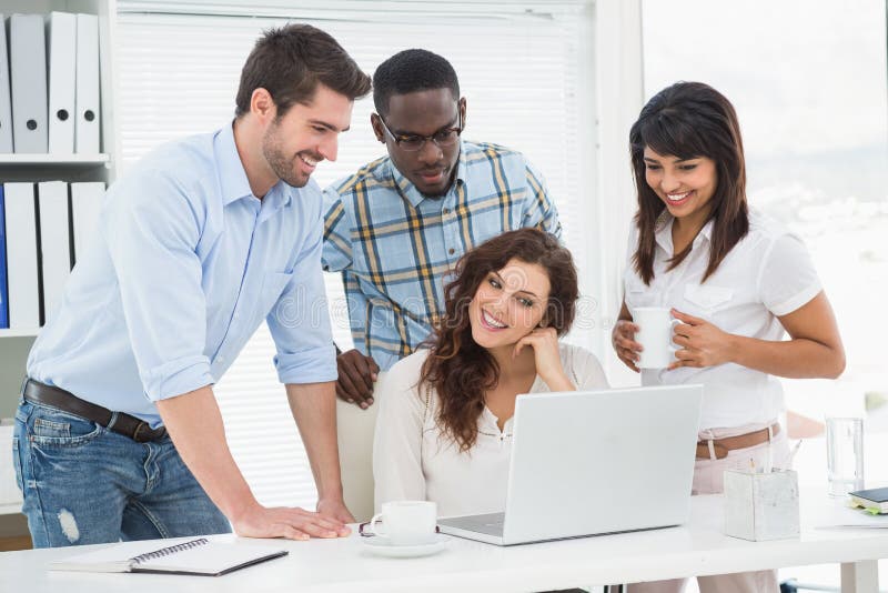 Happy Teamwork Using Laptop Together Stock Image - Image of happy ...