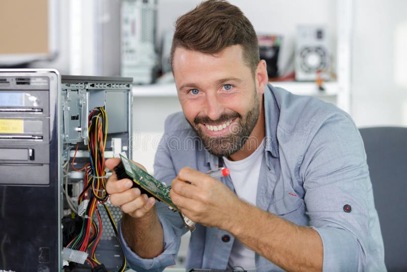 Happy Computer Engineer Working Broken Device Stock Photos - Free ...