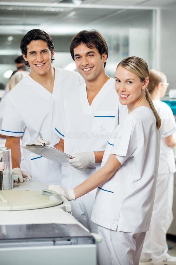 Happy Technicians in Laboratory Stock Image - Image of health, medicine ...