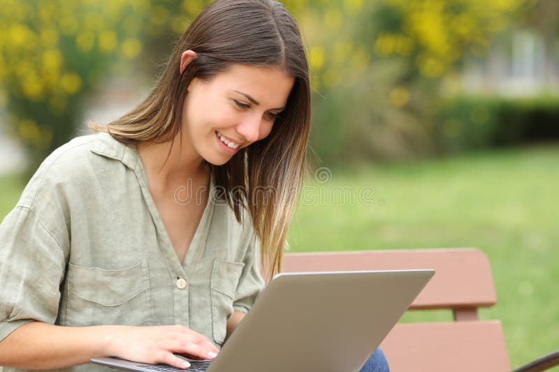 Happy Teen Checking Laptop on a Bench Stock Image - Image of laptop ...