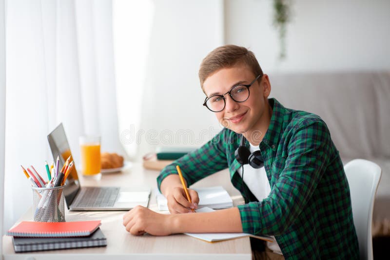 Happy Teen Guy Doing Homework at Home Stock Image - Image of sitting ...