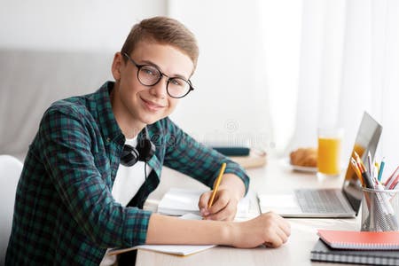 Happy Teen Guy Doing Homework at Home Stock Image - Image of notebook ...