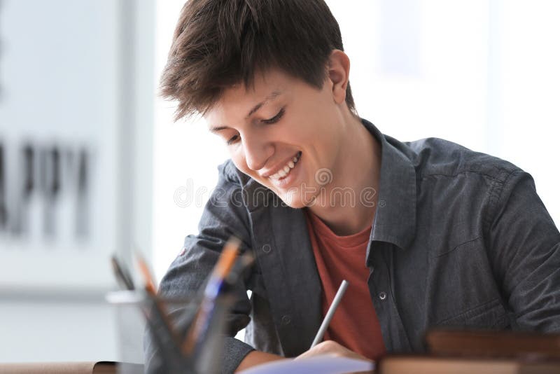 Happy Teenager Boy Doing Homework at Home Stock Image - Image of ...