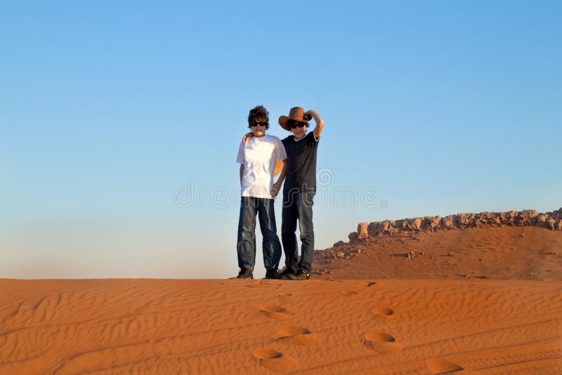 Happy Teens in a Desert stock image. Image of nature - 51116409
