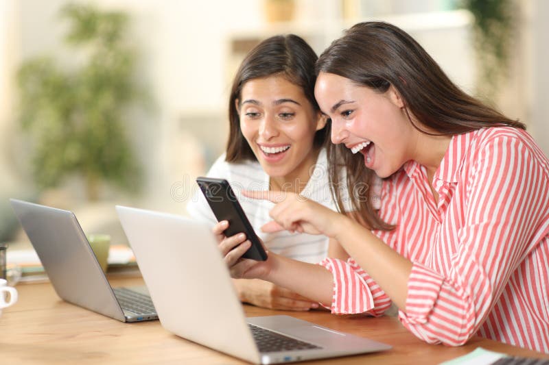 Happy Tele Workers Watching Amazing Phone Content Stock Photo - Image ...