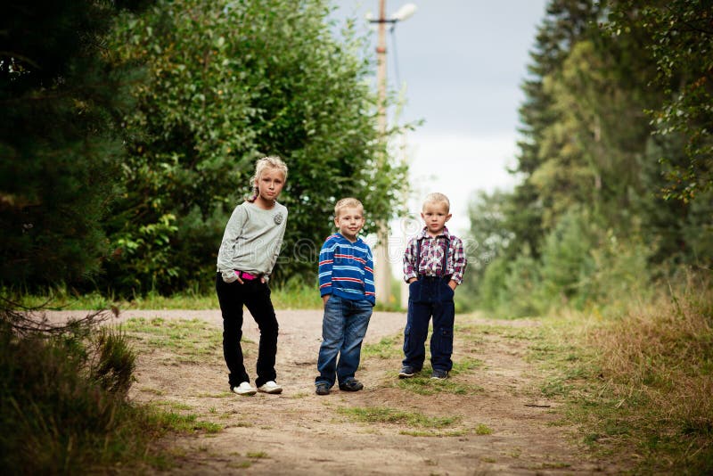 Happy Three children stock photo. Image of outdoor, hands - 34131972