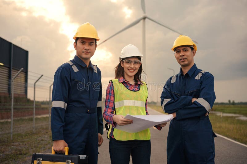 Portrait of Architector and Engineers Team in Helmets Standing at ...