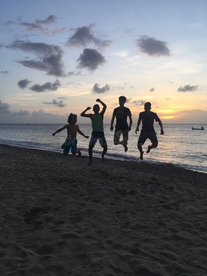 Sunset in Omoa Beach stock photo. Image of coast, light - 178590458