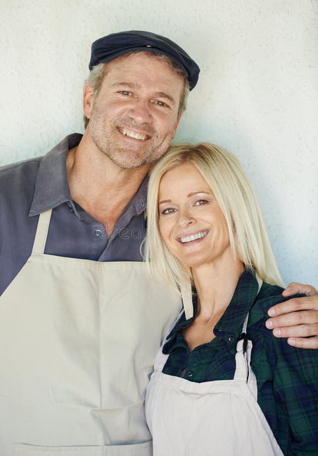 Happy To Share the Same Interests. a Farmer and His Wife Standing in ...