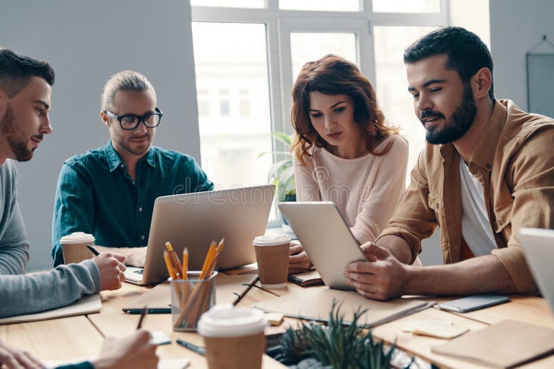 Happy to work together. stock photo. Image of adults - 144907644