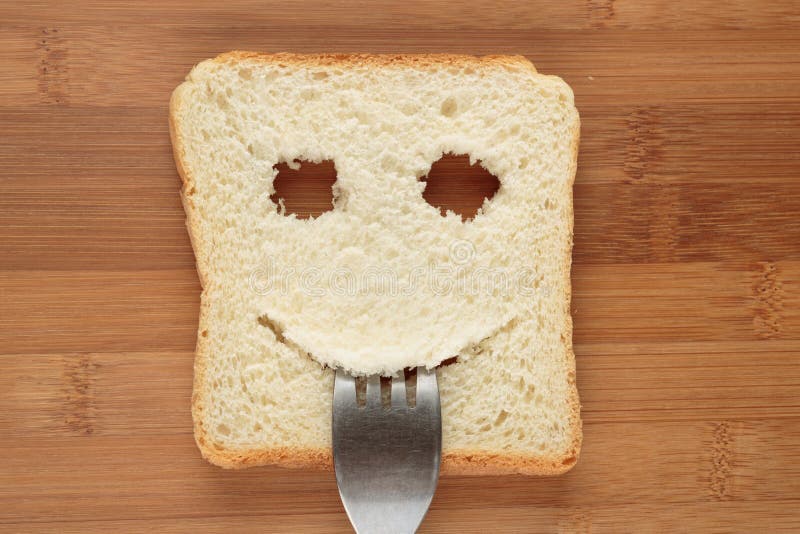 Happy Toast with a Fork in Her Mouth Stock Image - Image of cutting ...