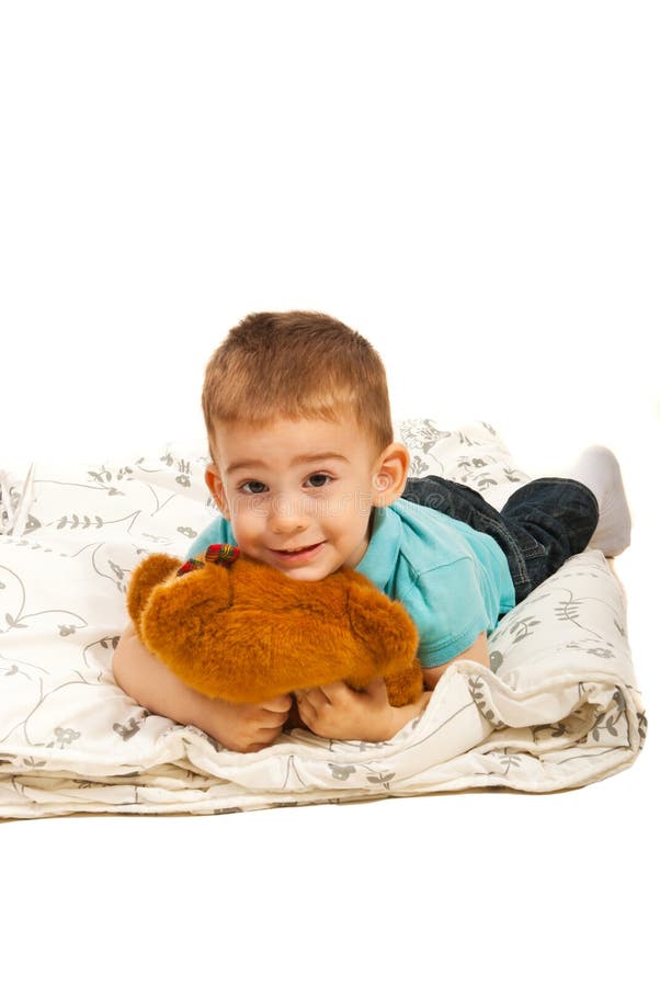 Happy Toddler Boy Lying Down Stock Image - Image of smile, person: 27452607
