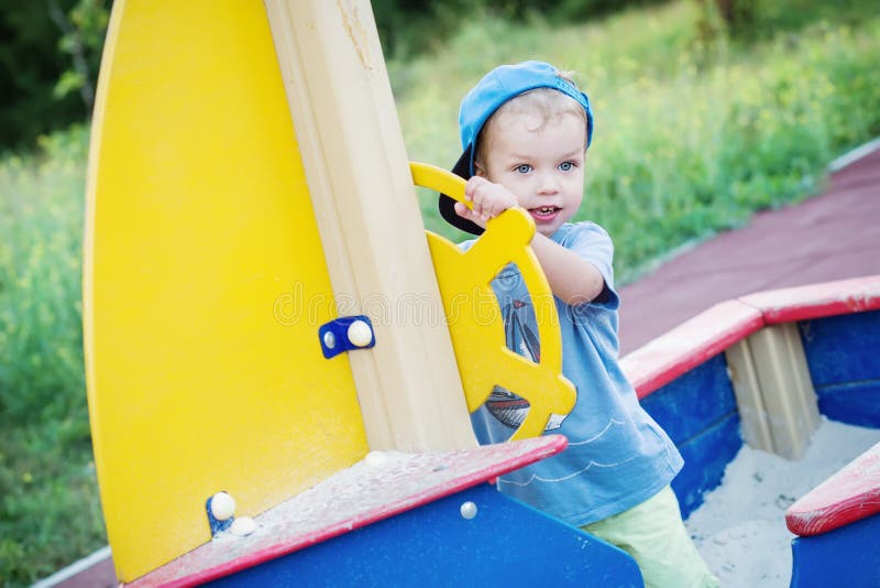 Happy toddler boy playing stock image. Image of interested - 60803705