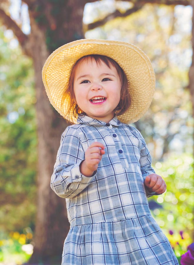 Happy Toddler Girl Playing Outside Stock Image - Image of child, green ...