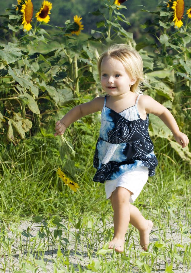 Happy Toddler Running in Field Stock Photo - Image of life, emotion ...