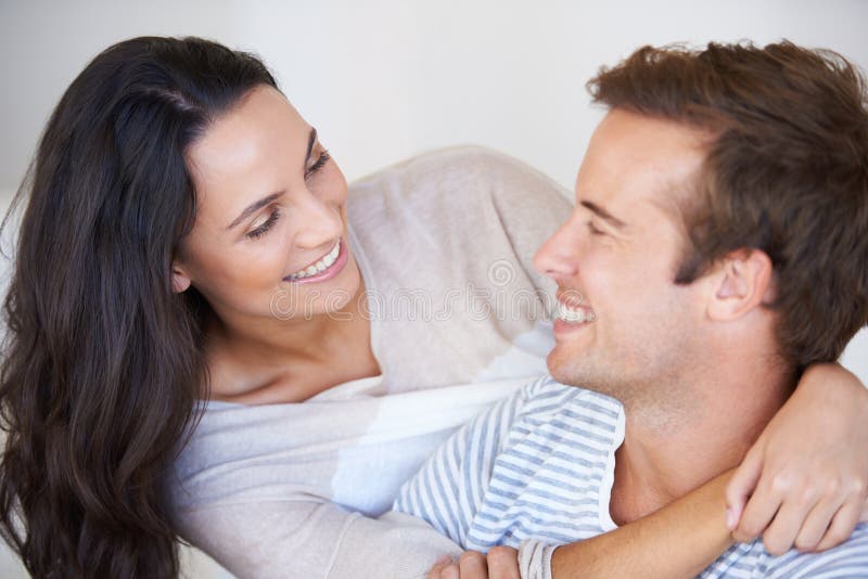 So Happy Together...a Happy Young Couple Playfully Embracing. Stock ...