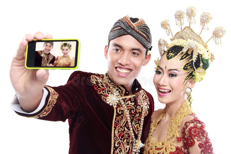 Happy Traditional Java Wedding Couple with Laptop Stock Photo - Image ...