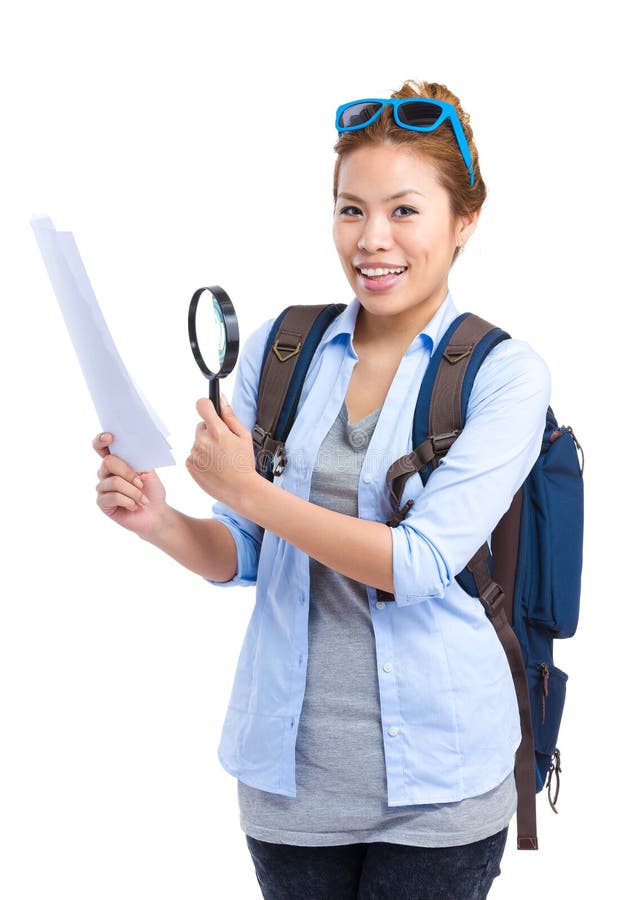 Happy Traveler Looking at Guide with Magnify Glass Stock Photo - Image ...
