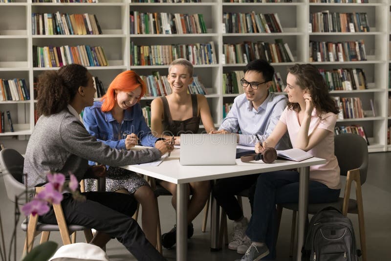 Happy Trendy Classmates Doing School Homework in Library Stock Photo ...