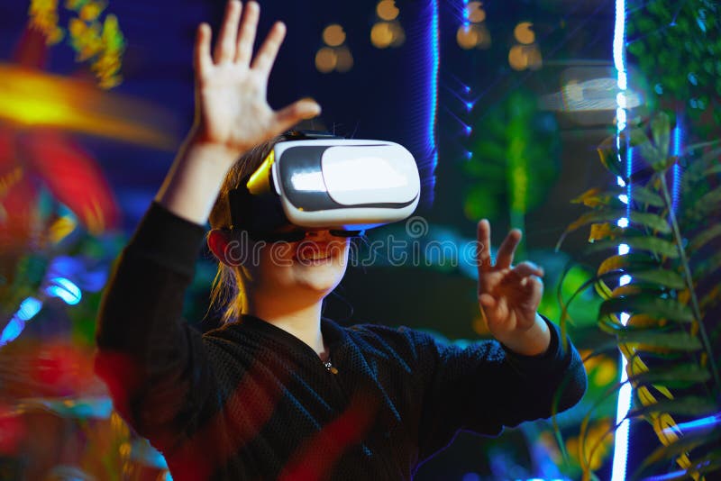 Happy Girl in Virtual Reality in Vr Headset Exploring Stock Image ...