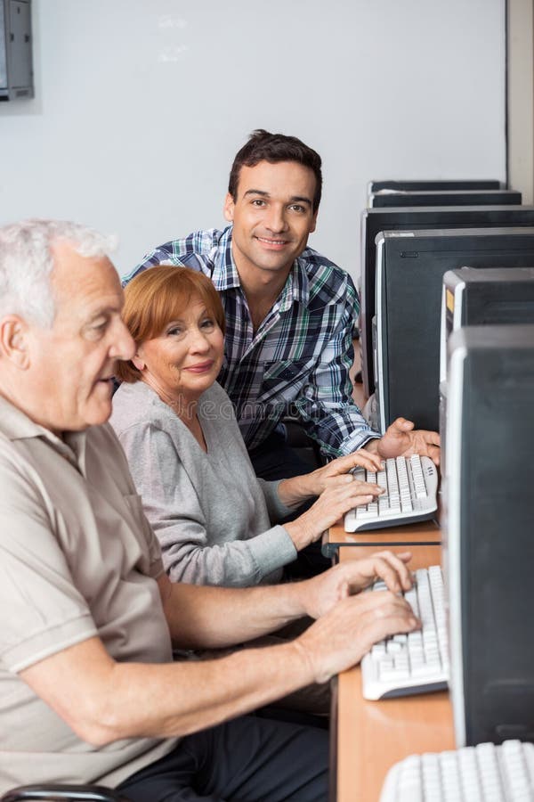 Senior Students Using Computers in Classroom Stock Image - Image of ...